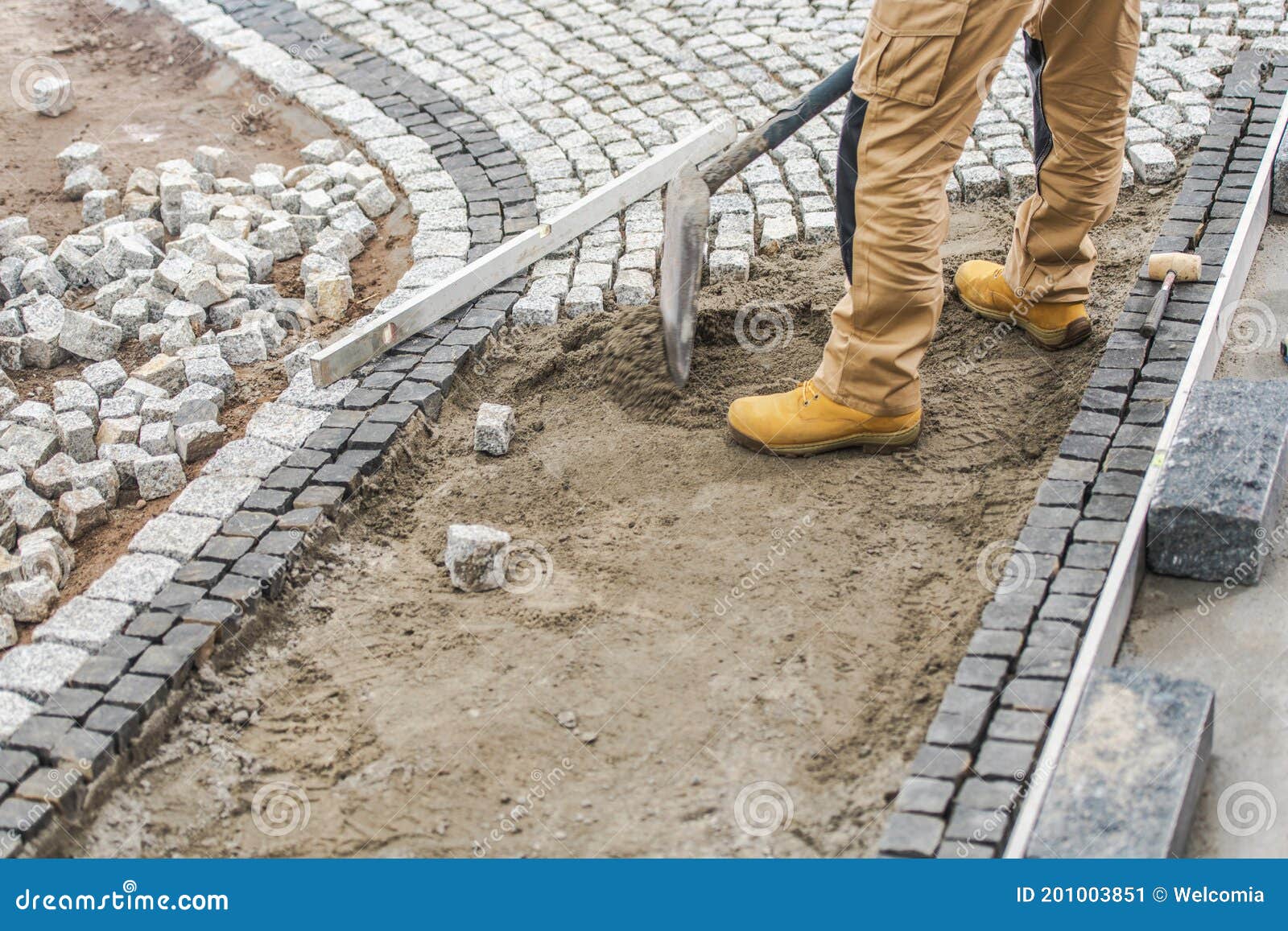 Worker Paving Residential Path Using Granite Bricks Stock Image - Image ...