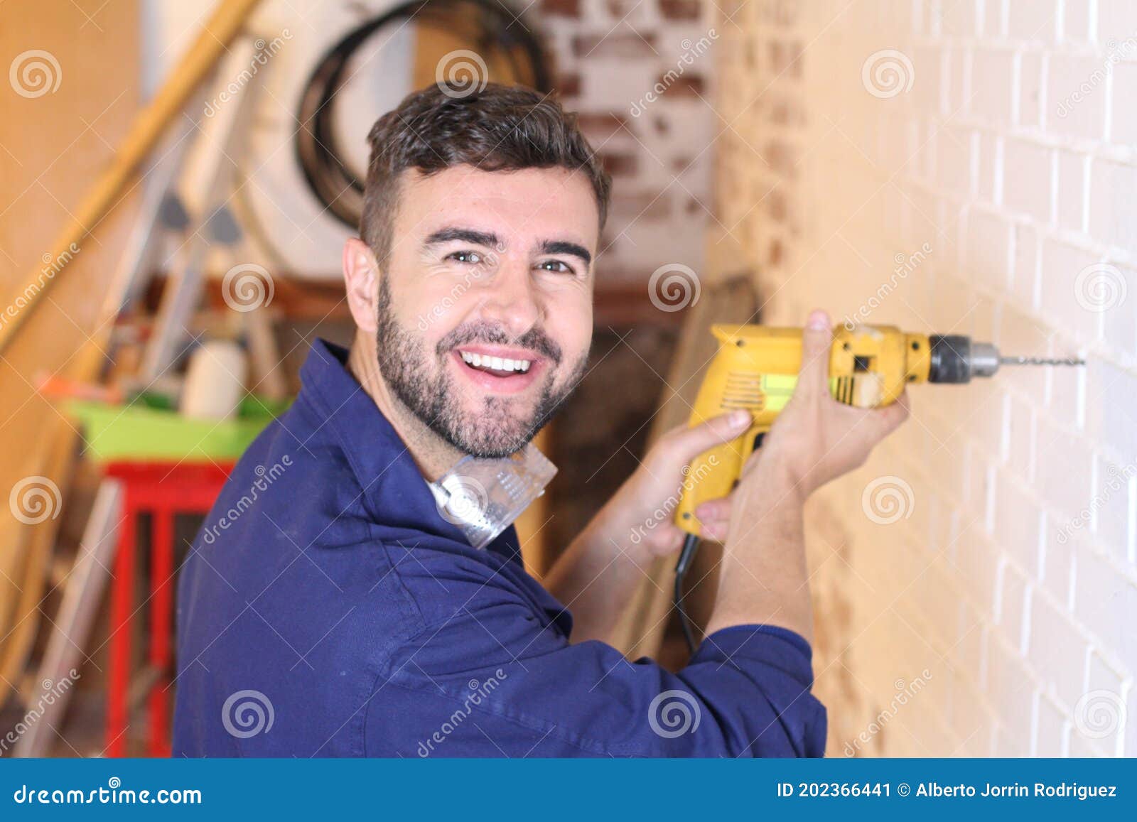 Worker Perforating Wall with a Drill Stock Image - Image of ...