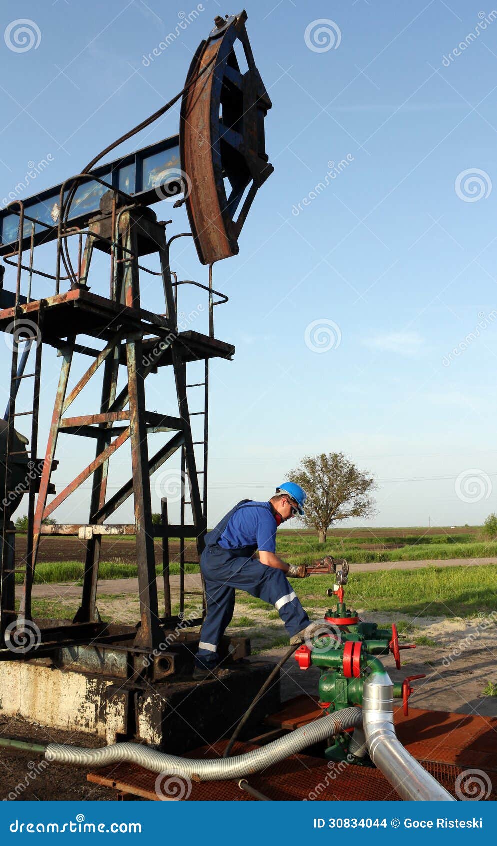 Worker with Pipe Wrench and Pipeline Stock Photo - Image of chief ...