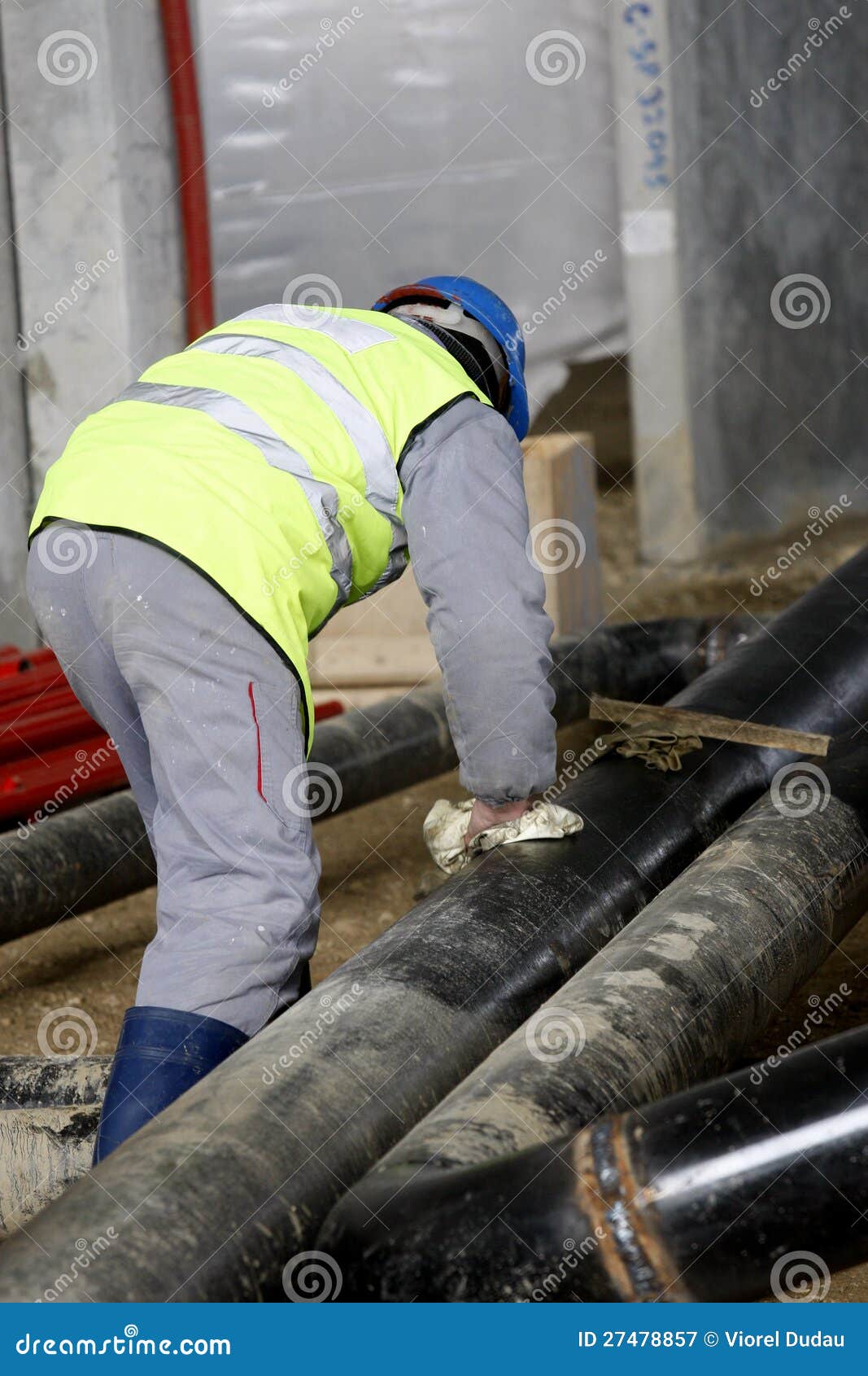 Worker with pipes editorial photography. Image of construct - 27478857
