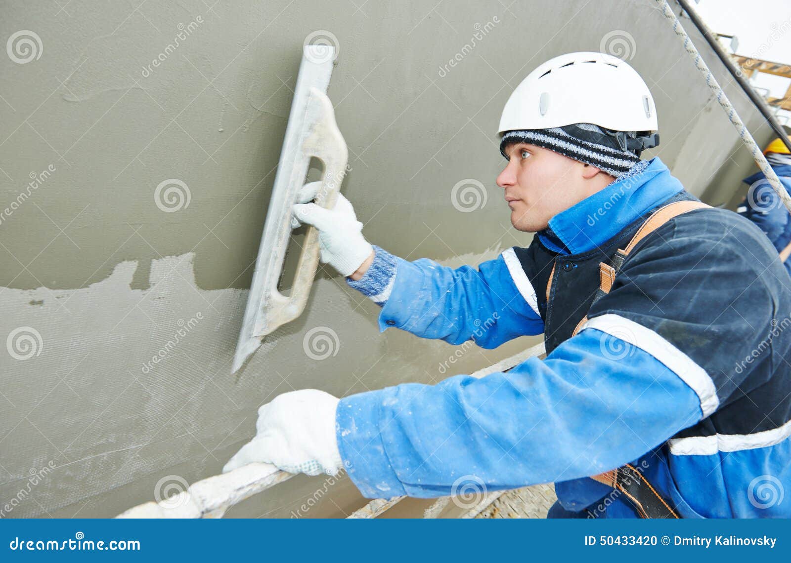 Worker at Plastering Facade Work Stock Photo - Image of roller, builder ...