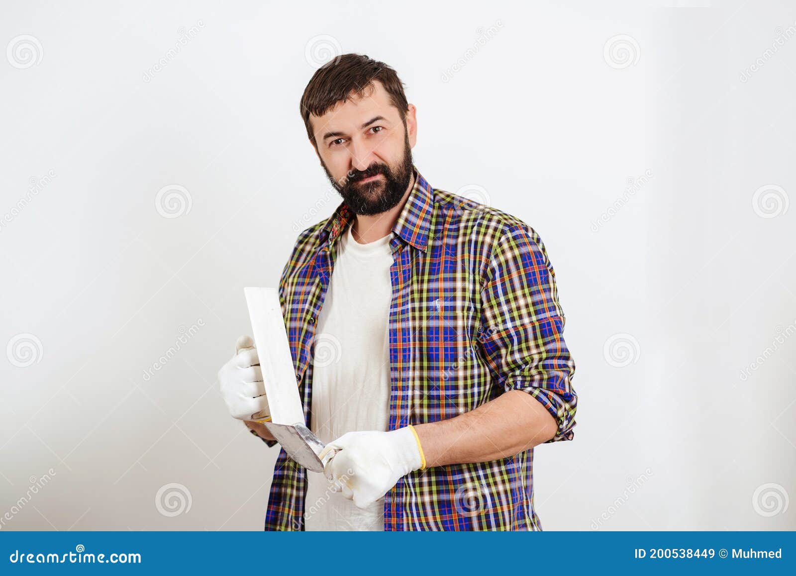 Worker Plastering the Wall Indoors. Bearded Man Plasterer with Tools ...