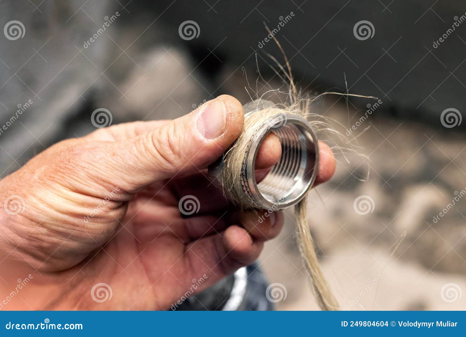 Worker, Plumber Winds Tow on the Sleeve for Threaded Conne Stock Photo ...
