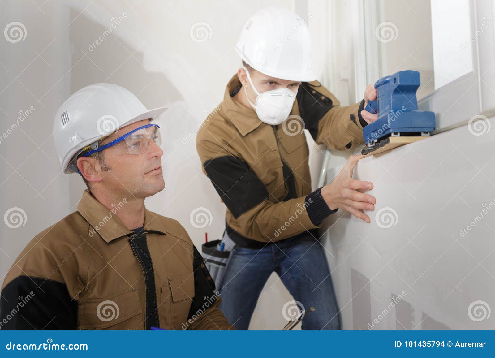 Worker Polishing Wall with Help Boss Stock Photo - Image of ...