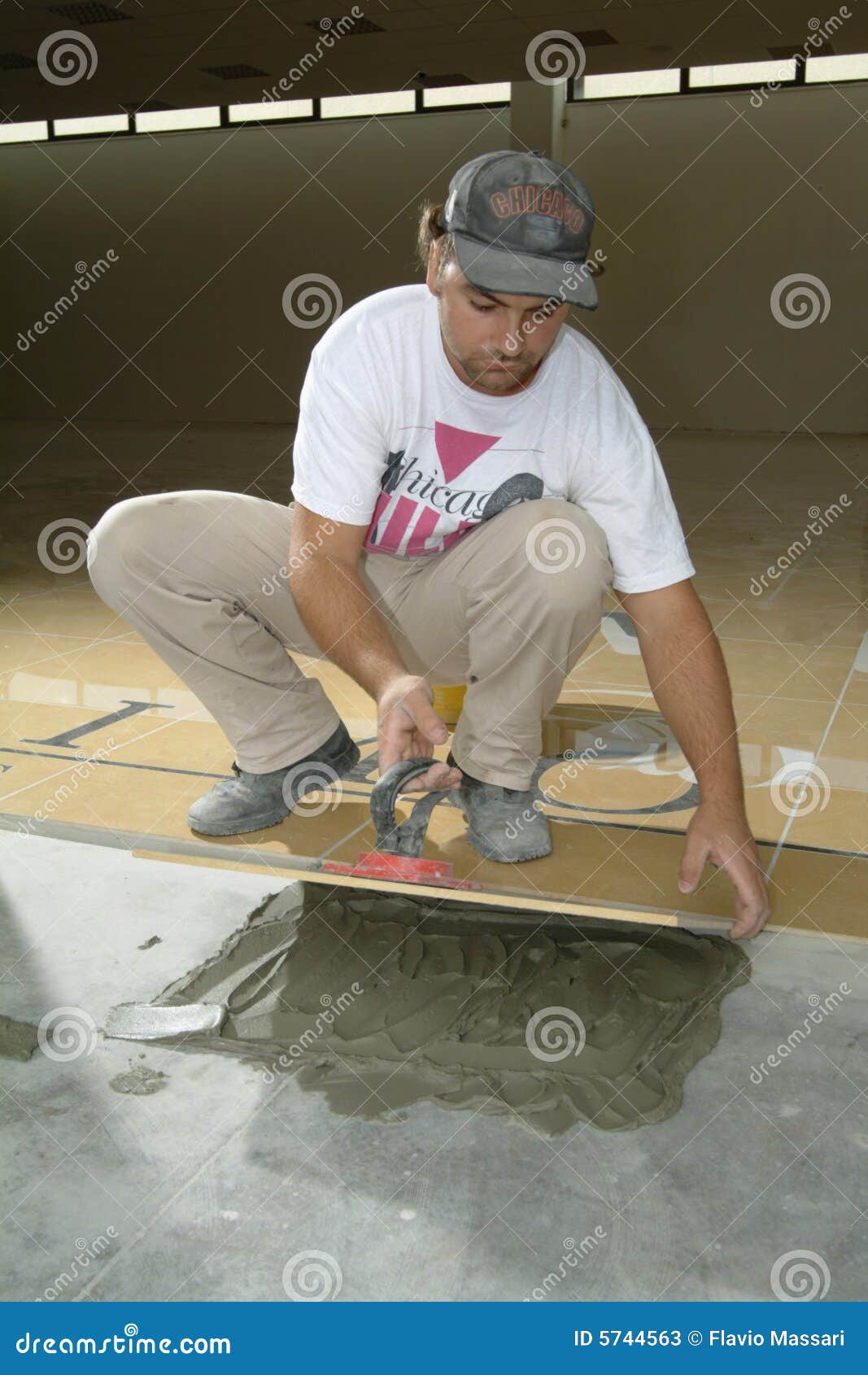 Worker posing a tile stock image. Image of worker, posing - 5744563