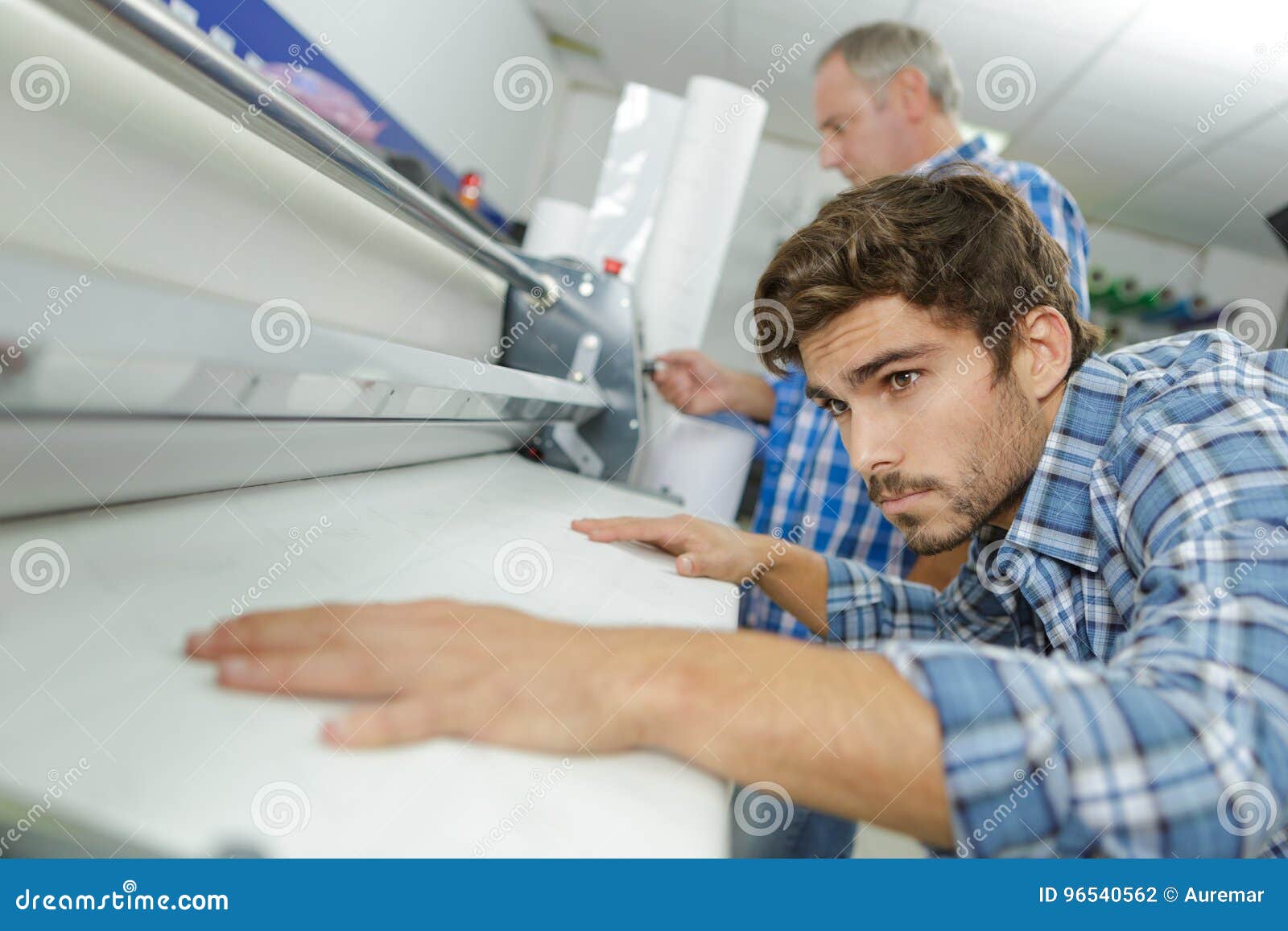 Worker at Post Press Finishing Line Machine Stock Photo - Image of ...