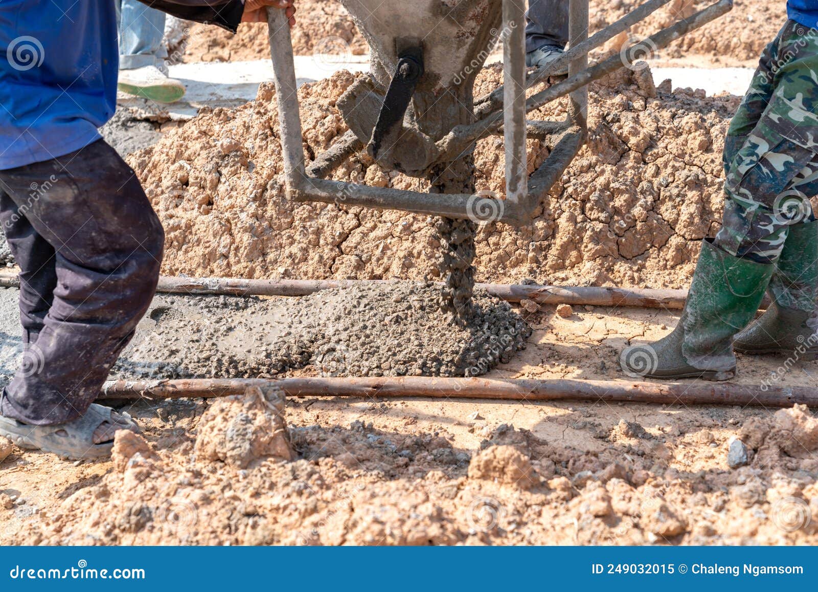 Worker Pour Lean Concrete on Formwork before Steel Rebar Foundation ...