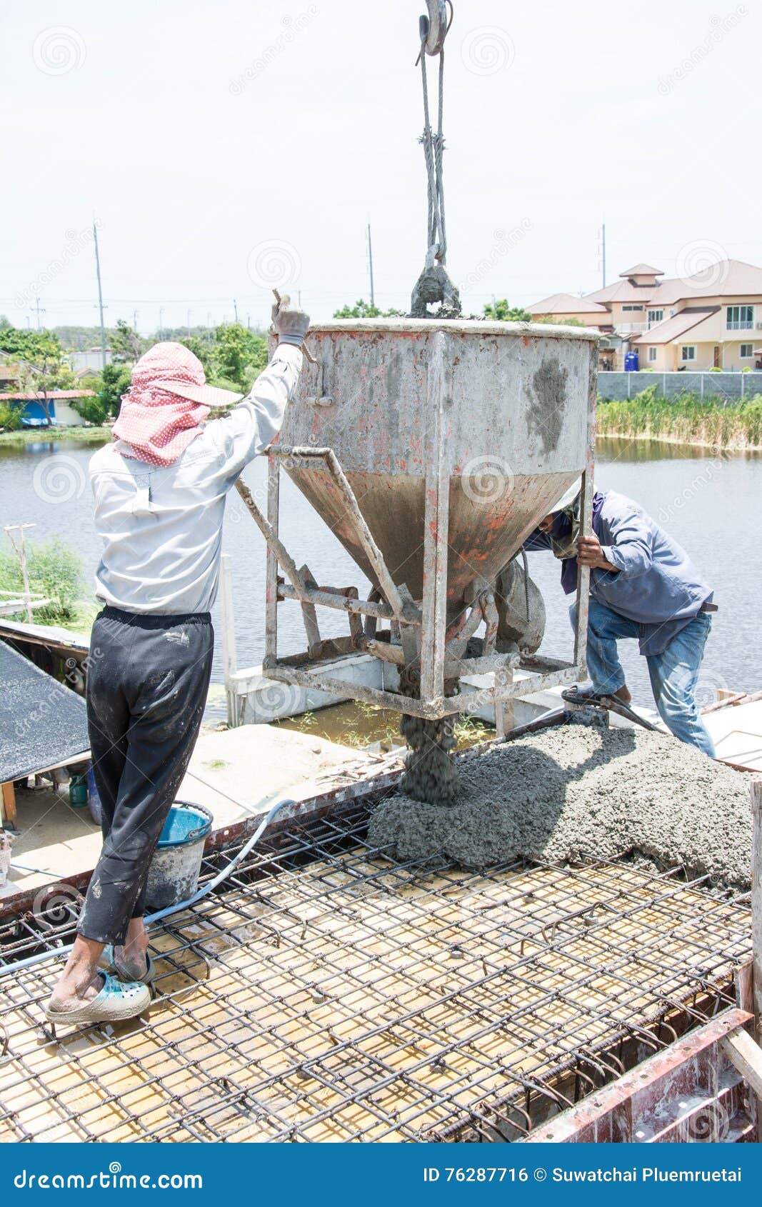 Worker Pouring Concrete Works at Construction Site Stock Photo - Image ...