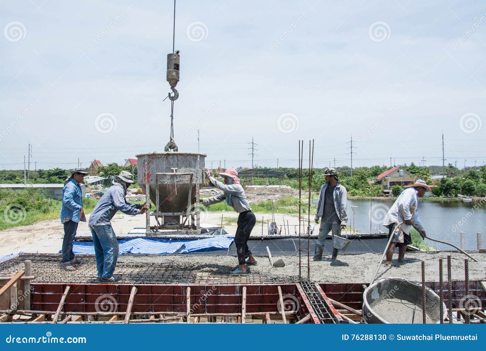 Worker Pouring Concrete Works at Construction Site Editorial Image ...