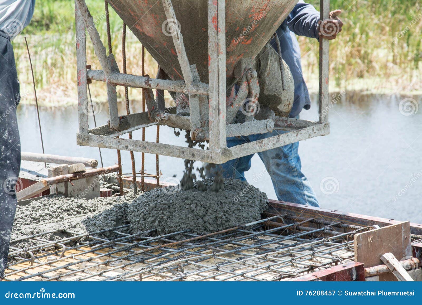 Worker Pouring Concrete Works at Construction Site Stock Image - Image ...