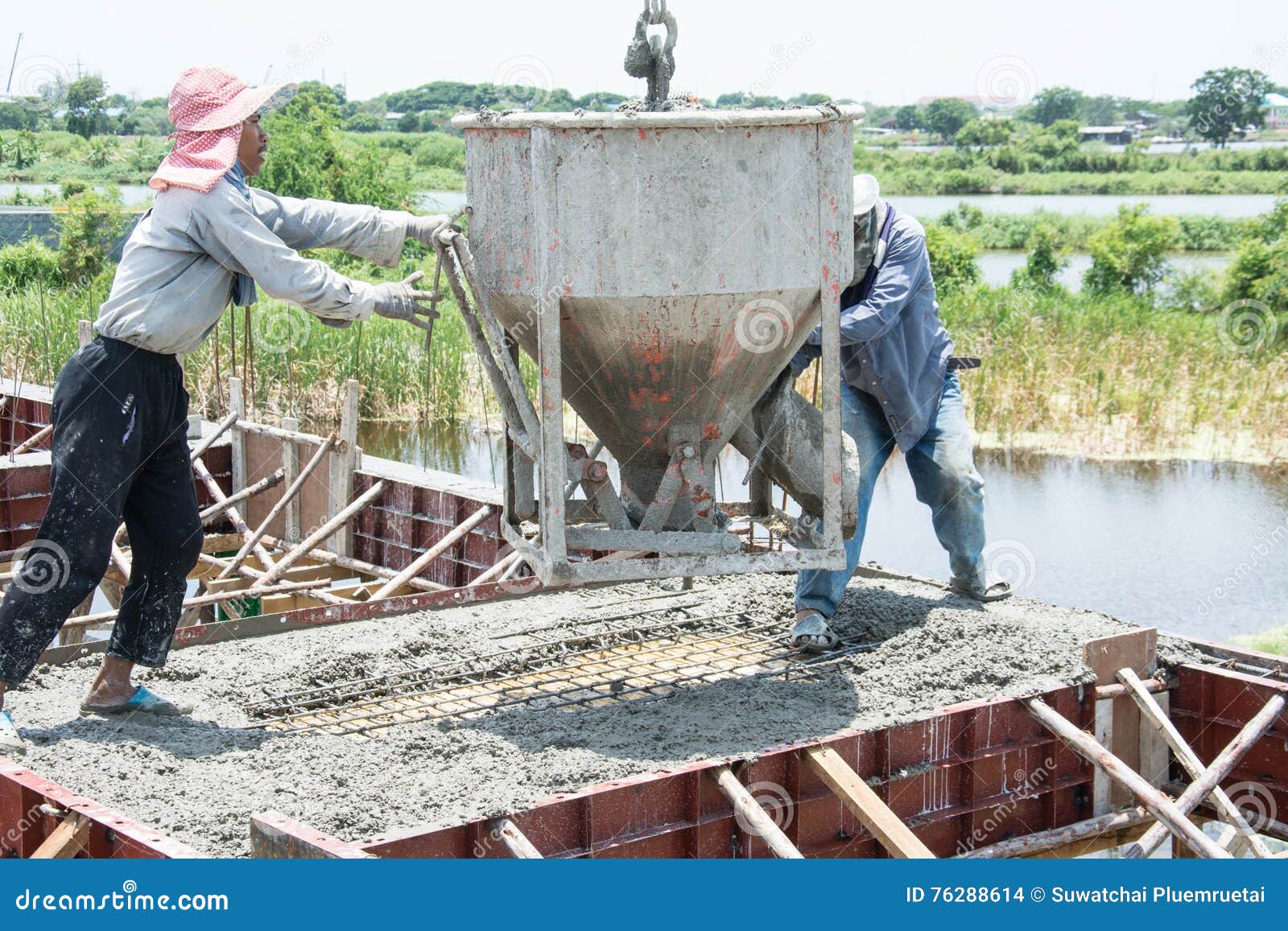 Worker Pouring Concrete Works at Construction Site Editorial Stock ...