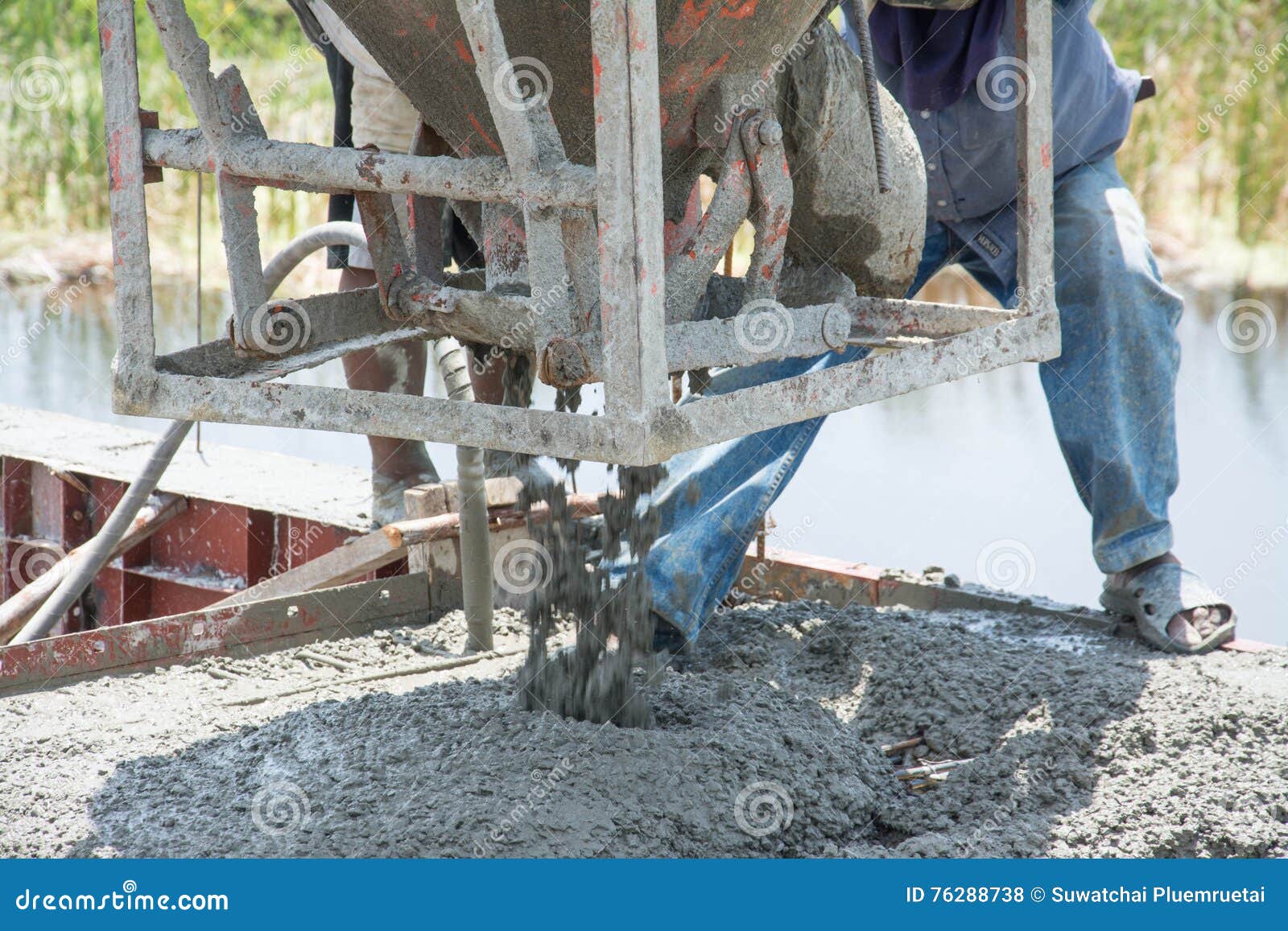Worker Pouring Concrete Works at Construction Site Stock Photo - Image ...