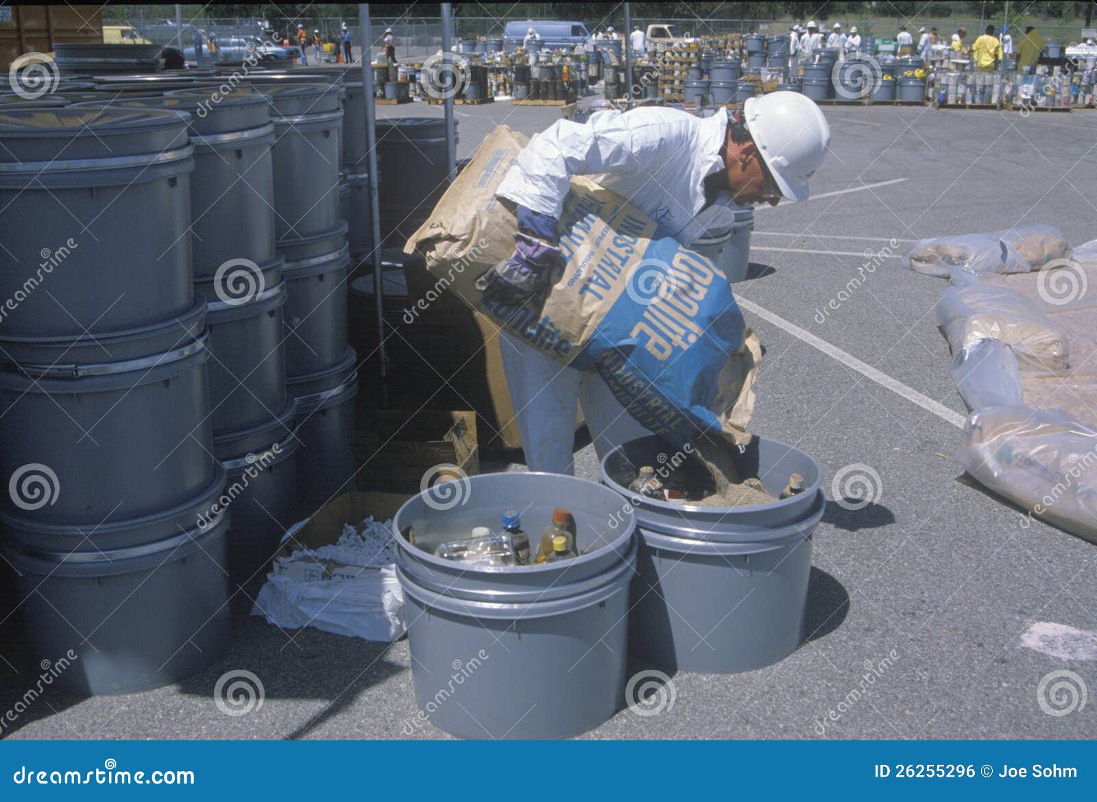A Worker Pouring the Contents of a Bag Editorial Photo - Image of ...