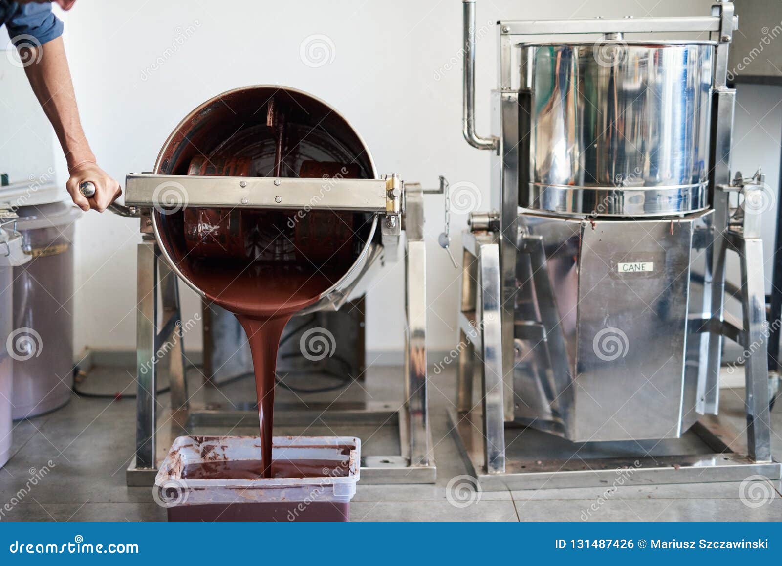Melted Chocolate Being Poured into a Factory Container Stock Photo ...
