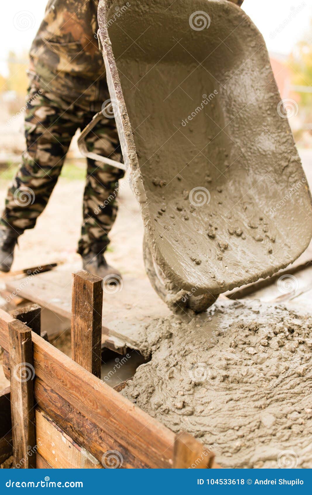 Worker Pours Concrete Mortar on a Construction Site Stock Photo - Image ...