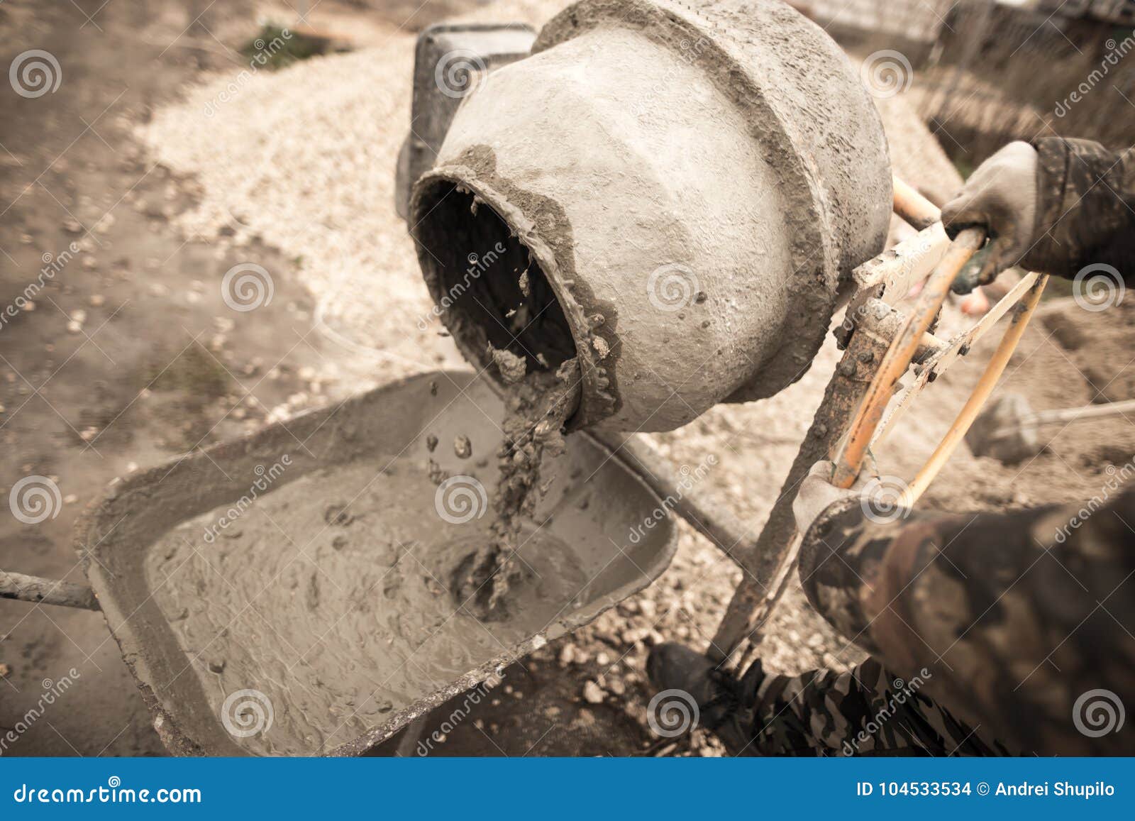 Worker Pours Concrete Mortar on a Construction Site Stock Photo - Image ... Worker Pours Concrete Mortar on a Construction Site Stock Photo - Image ...