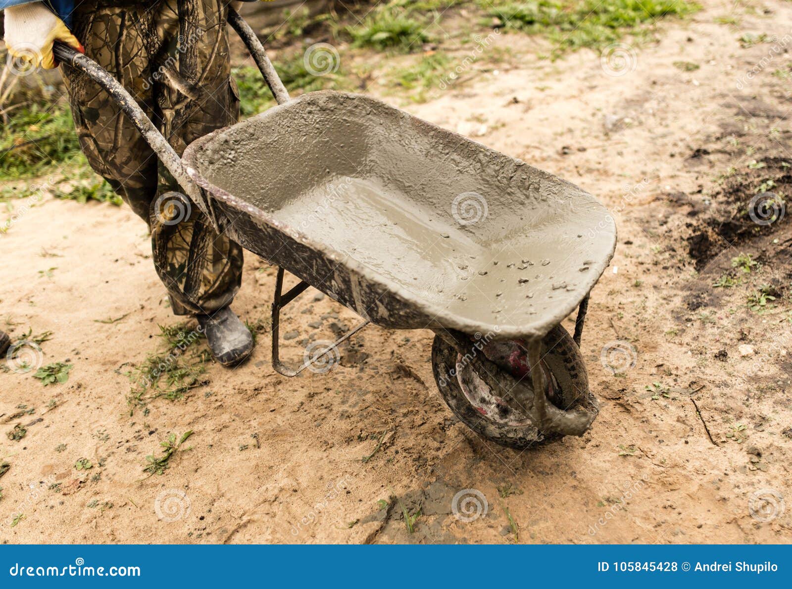 Worker Pours Concrete Mortar on a Construction Site Stock Photo - Image ... Worker Pours Concrete Mortar on a Construction Site Stock Photo - Image ...