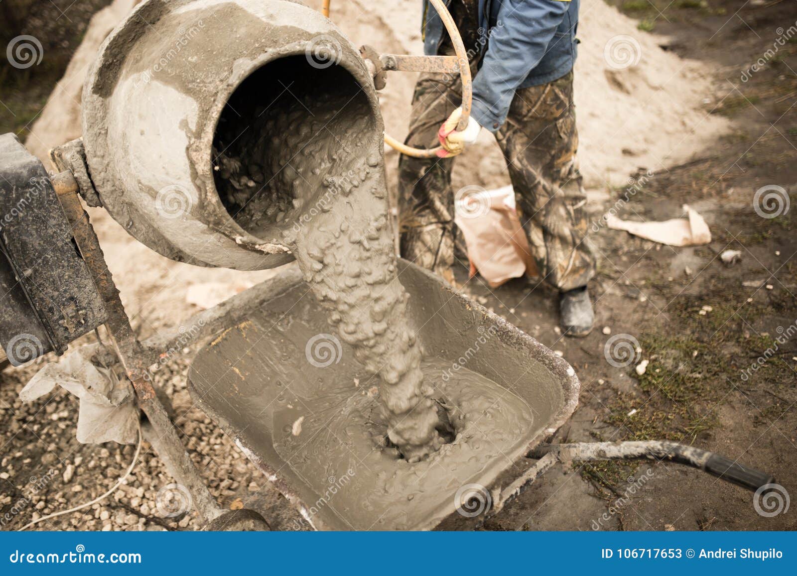 Worker Pours Concrete Mortar on a Construction Site Stock Image - Image ... Worker Pours Concrete Mortar on a Construction Site Stock Image - Image ...