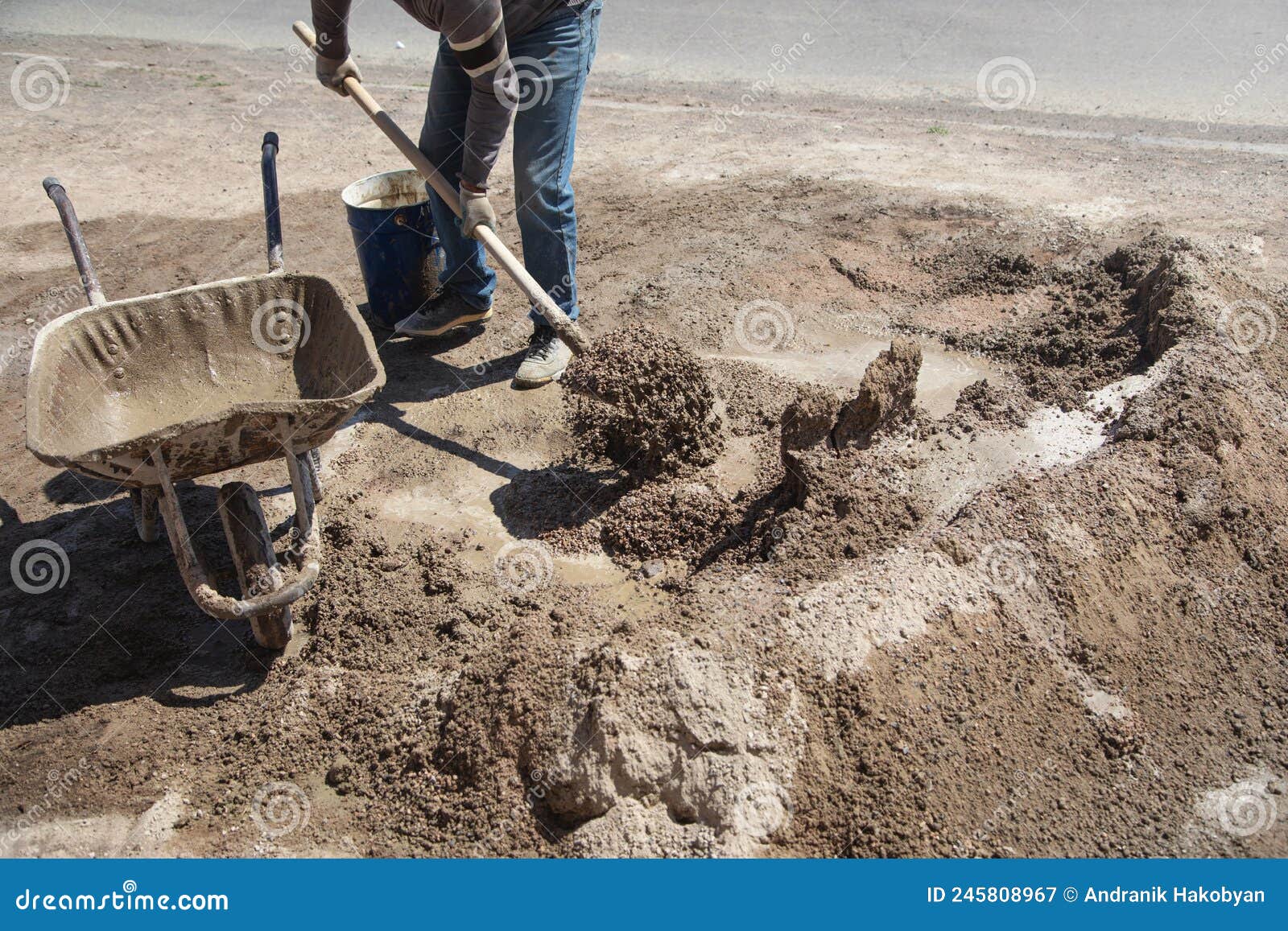 Worker Prepare Concrete with Shovel at Construction Site Stock Image ...