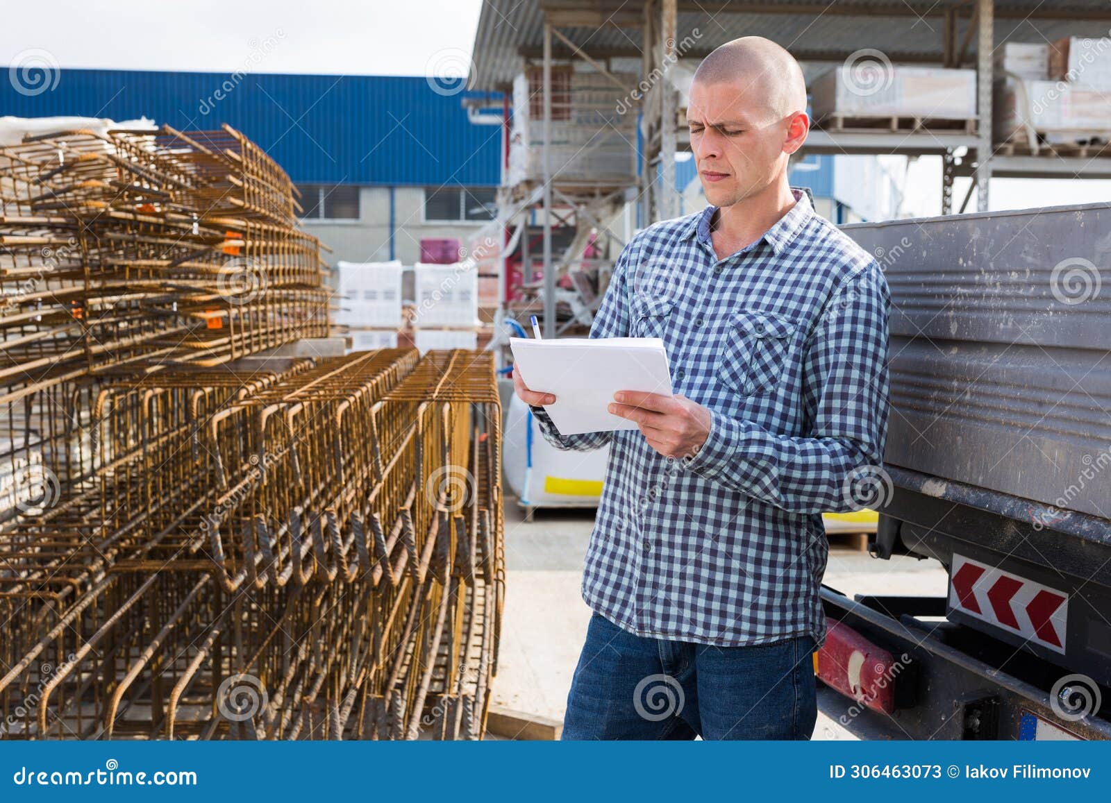 Worker Prepares Metal Rebar for Loading Onto Truck Stock Image - Image ...