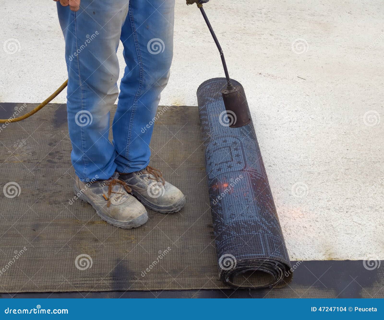 Worker Preparing Part of Bitumen Roofing Felt Roll Stock Photo - Image ...