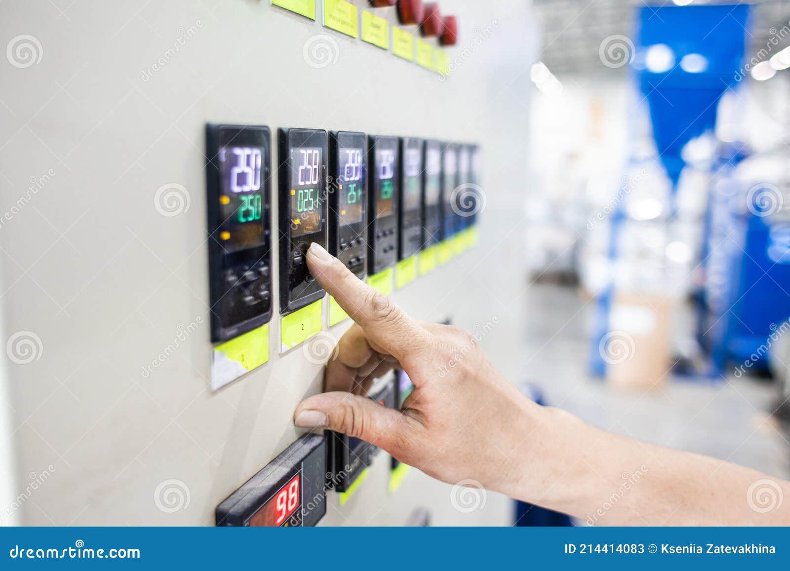 A Worker Presses a Button and Starts an Automatic Manufacturing Process ...