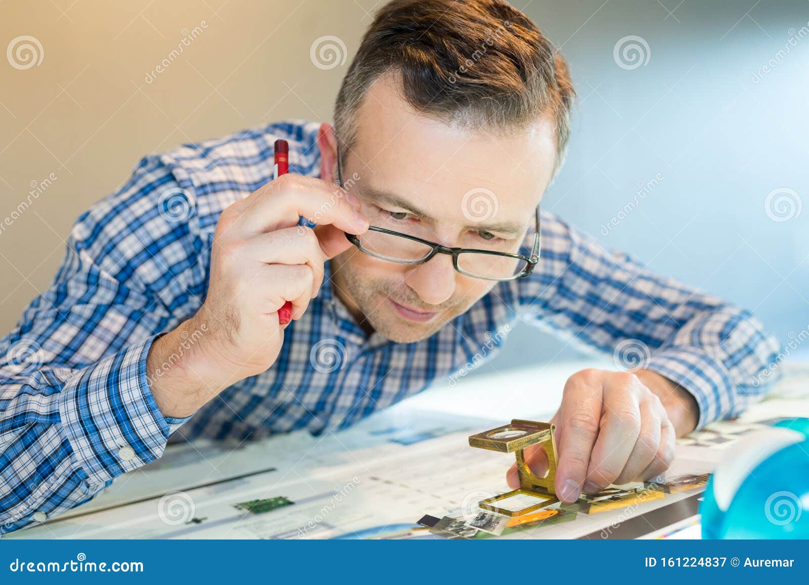 Worker in Printing Uses Magnifying Glass Stock Image - Image of ...