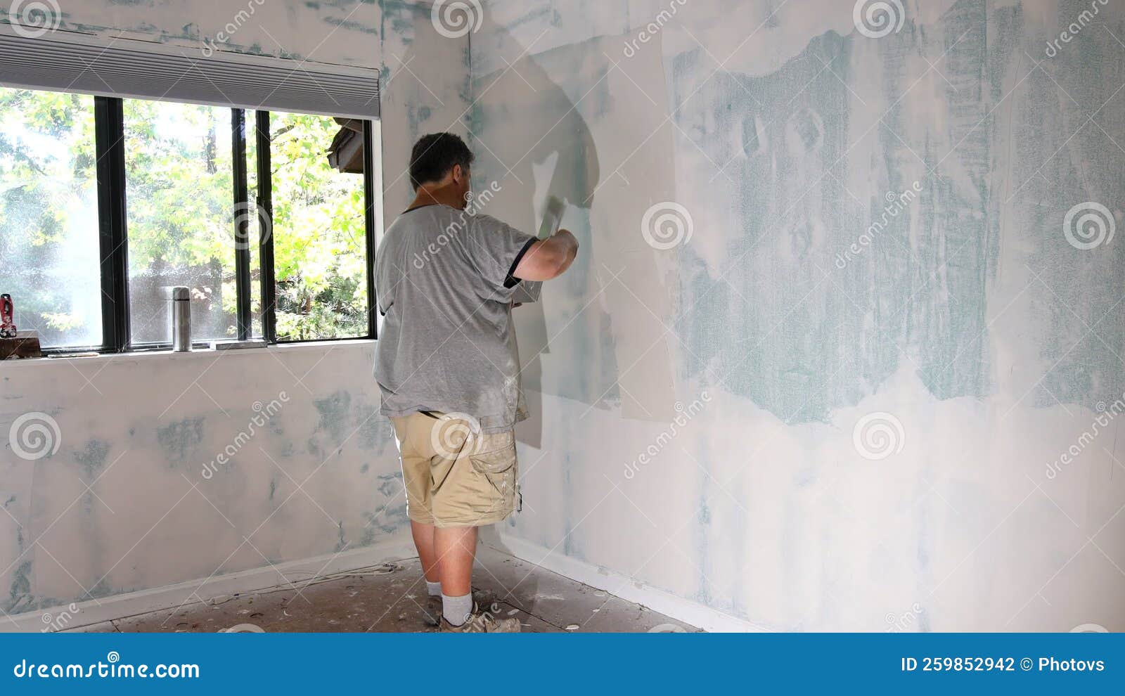 Worker Trowels Putty on Drywall Finishing Putty with Hand a Spatula ...