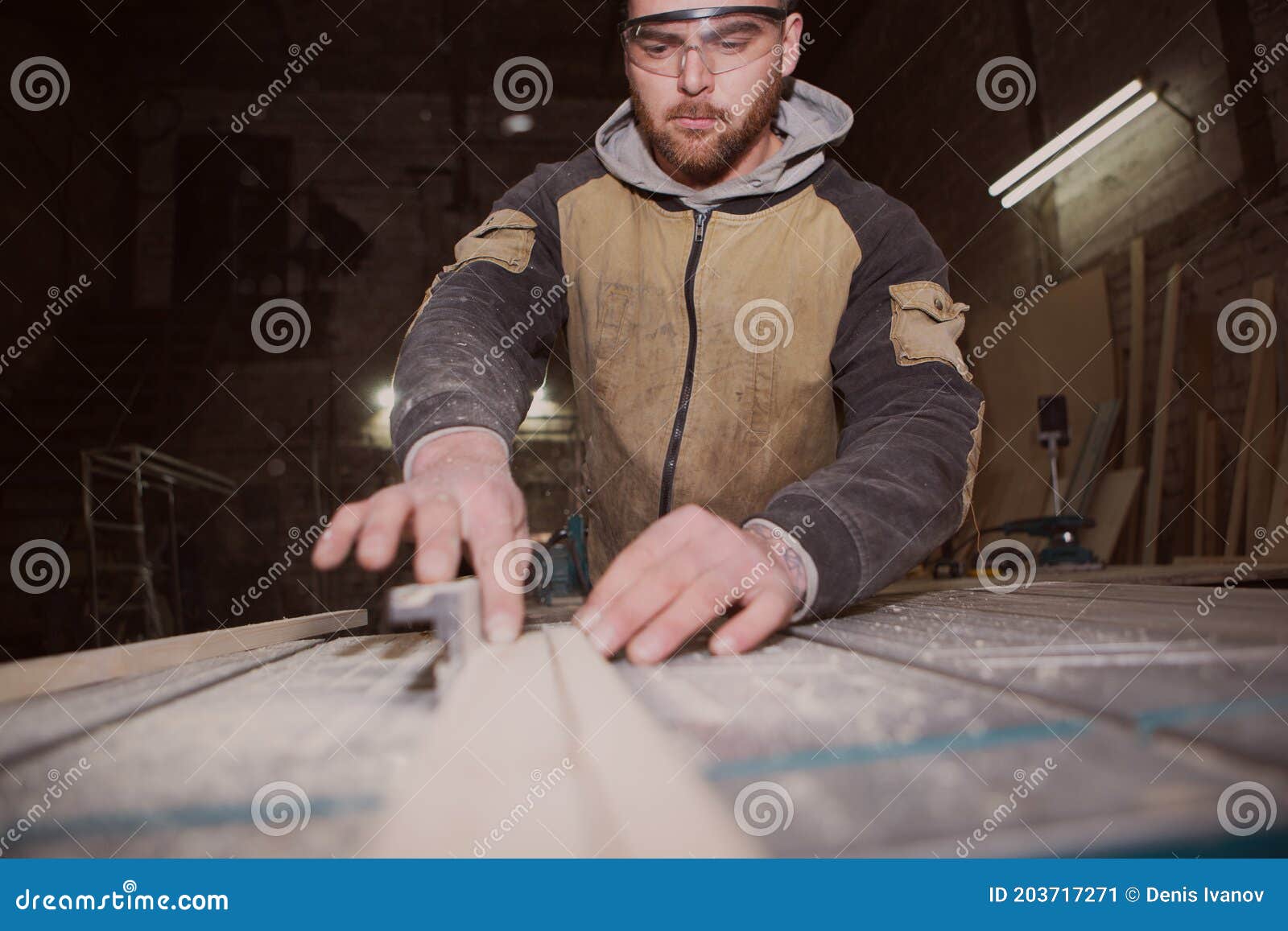 A Worker Processes a Board on a Woodworking Machine Stock Image - Image ...