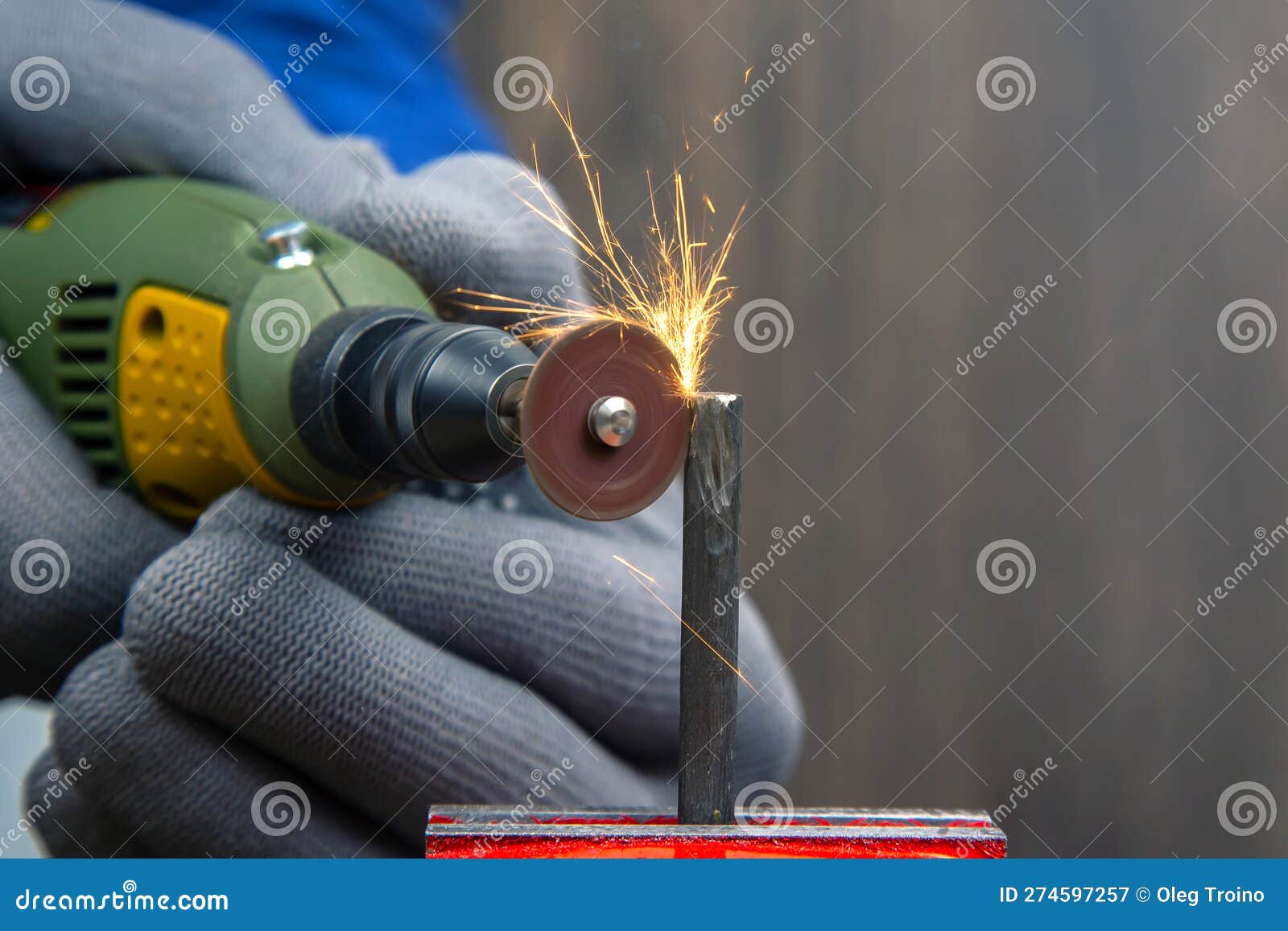 Worker Processes Metal with Engraving Drill Close-up. the Work of the ...