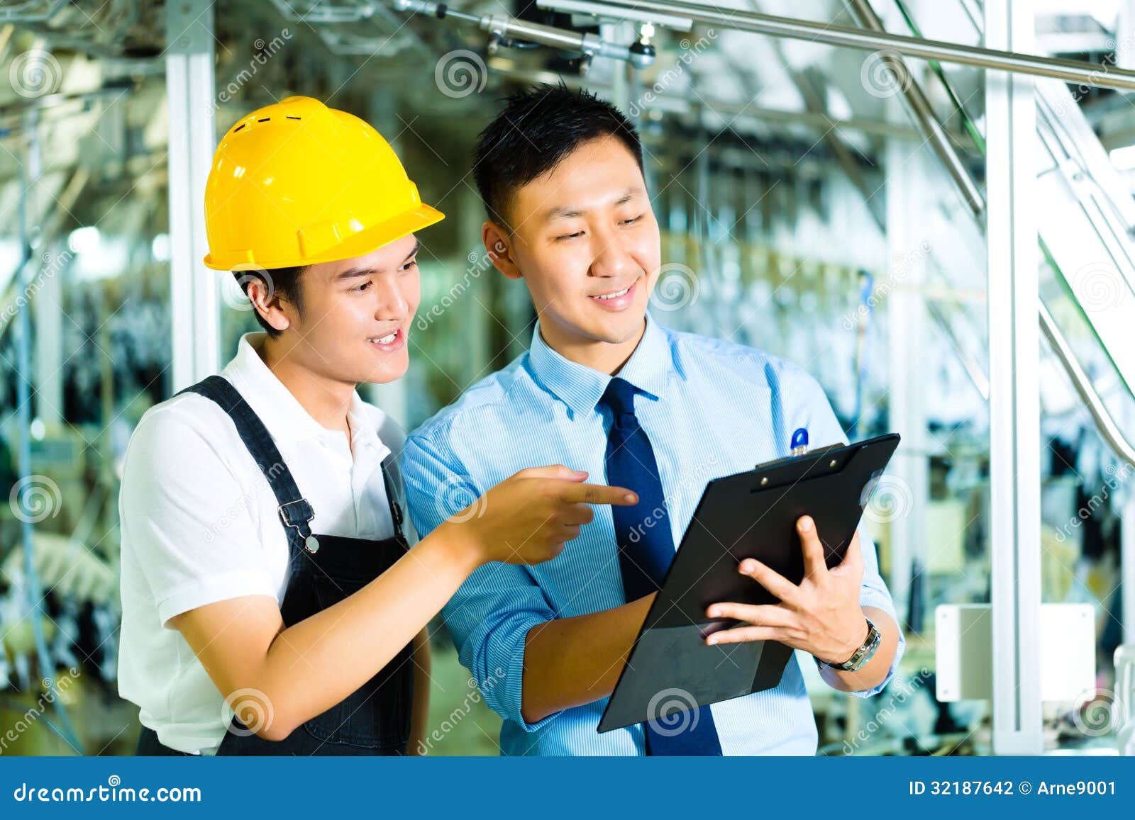 Worker and Production Manager with Clipboard Stock Photo - Image of ...