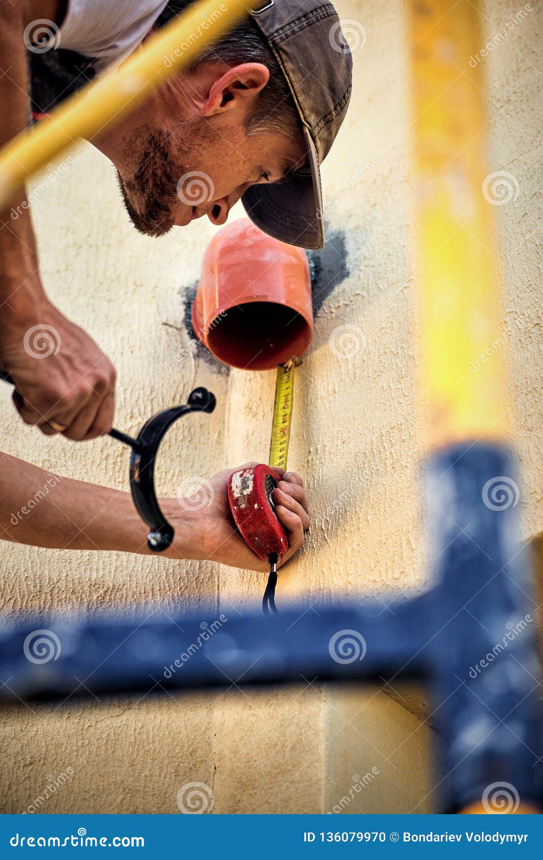 Builder at the Finish House Working with the Tool Stock Photo - Image ...