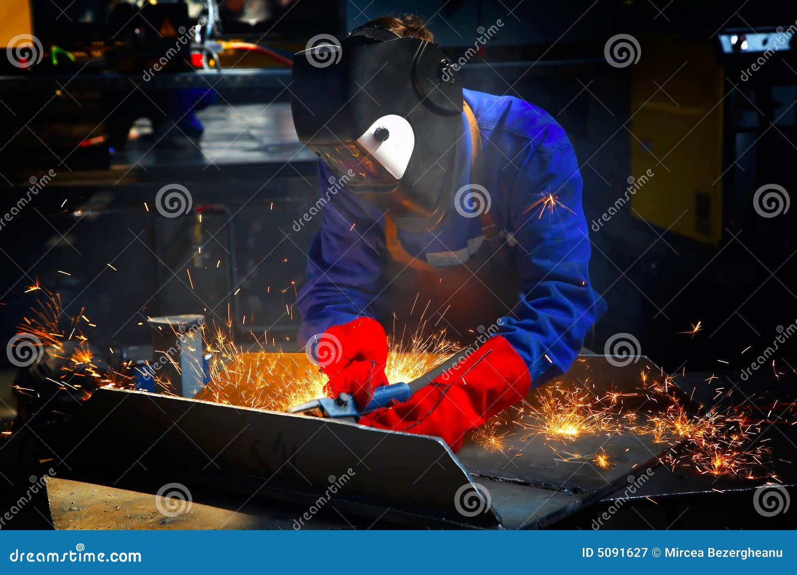 Worker with Protective Mask and Gloves Grinding/we Stock Image - Image ...