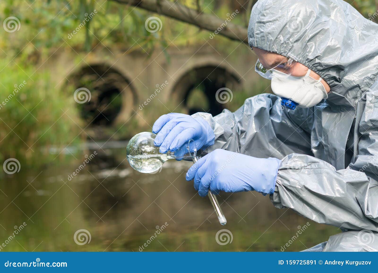 Worker in Protective Suit Checks River Water for Pollution and ...