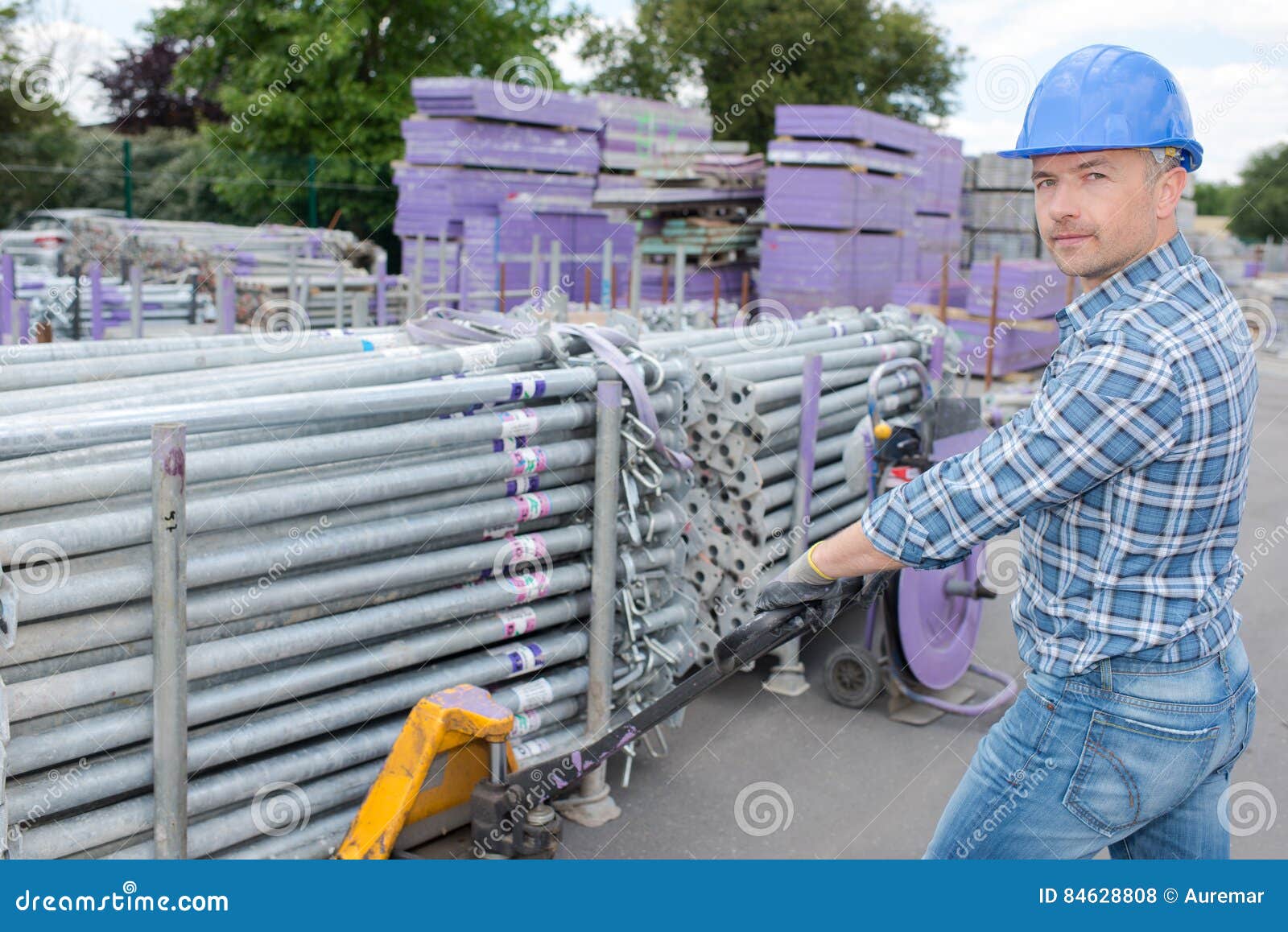 Worker Pulling Pallet Metal Tubes Stock Photos - Free & Royalty-Free ...