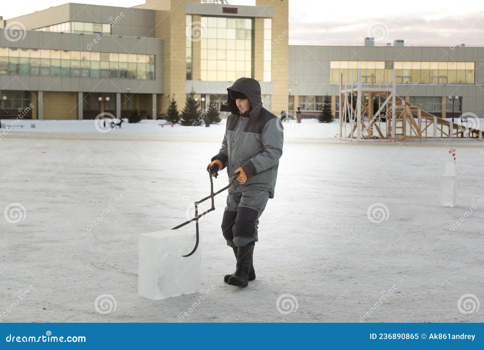 Assembler with Steel Tongs Pulls Ice Block Stock Image - Image of ...