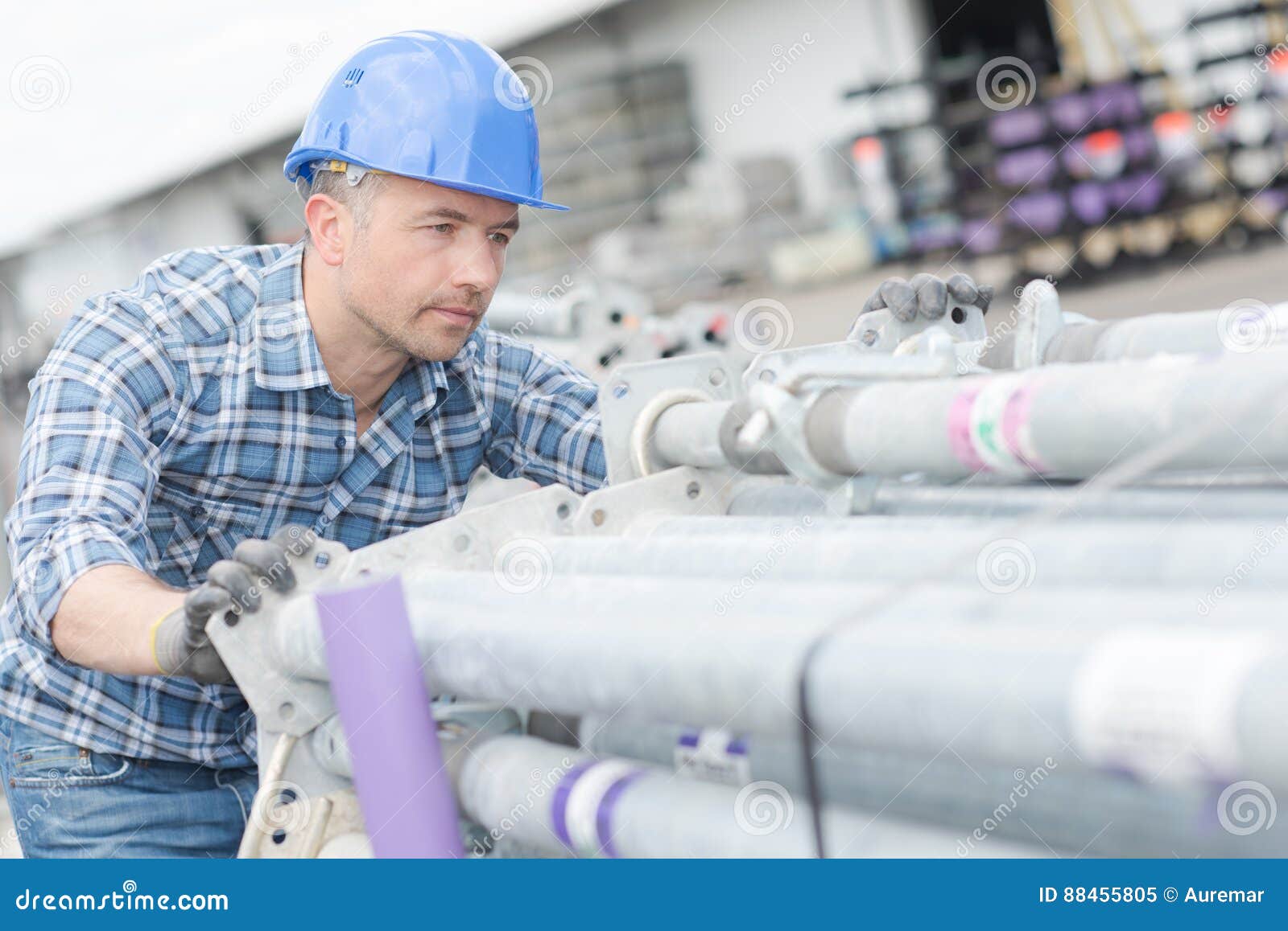 Worker Pushing Stack Scaffold Poles Stock Image - Image of industrial ...
