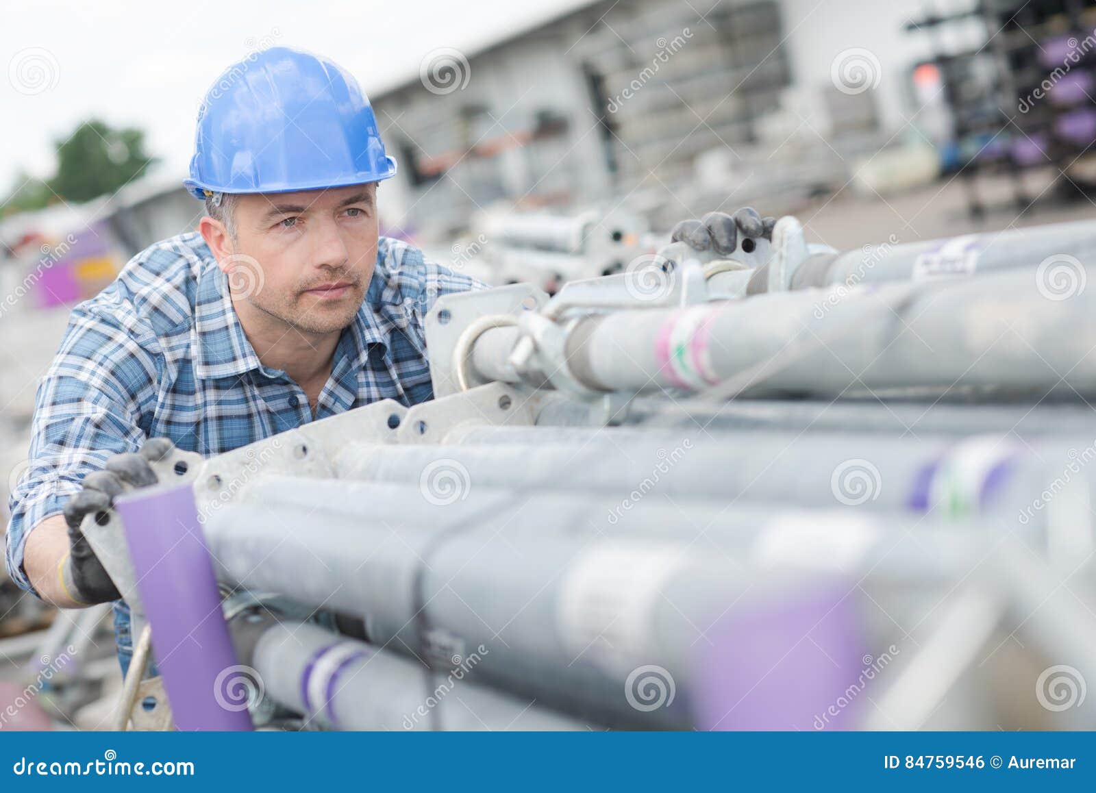 Worker Pushing Stack Scaffolding Tubes Stock Photo - Image of toil ...