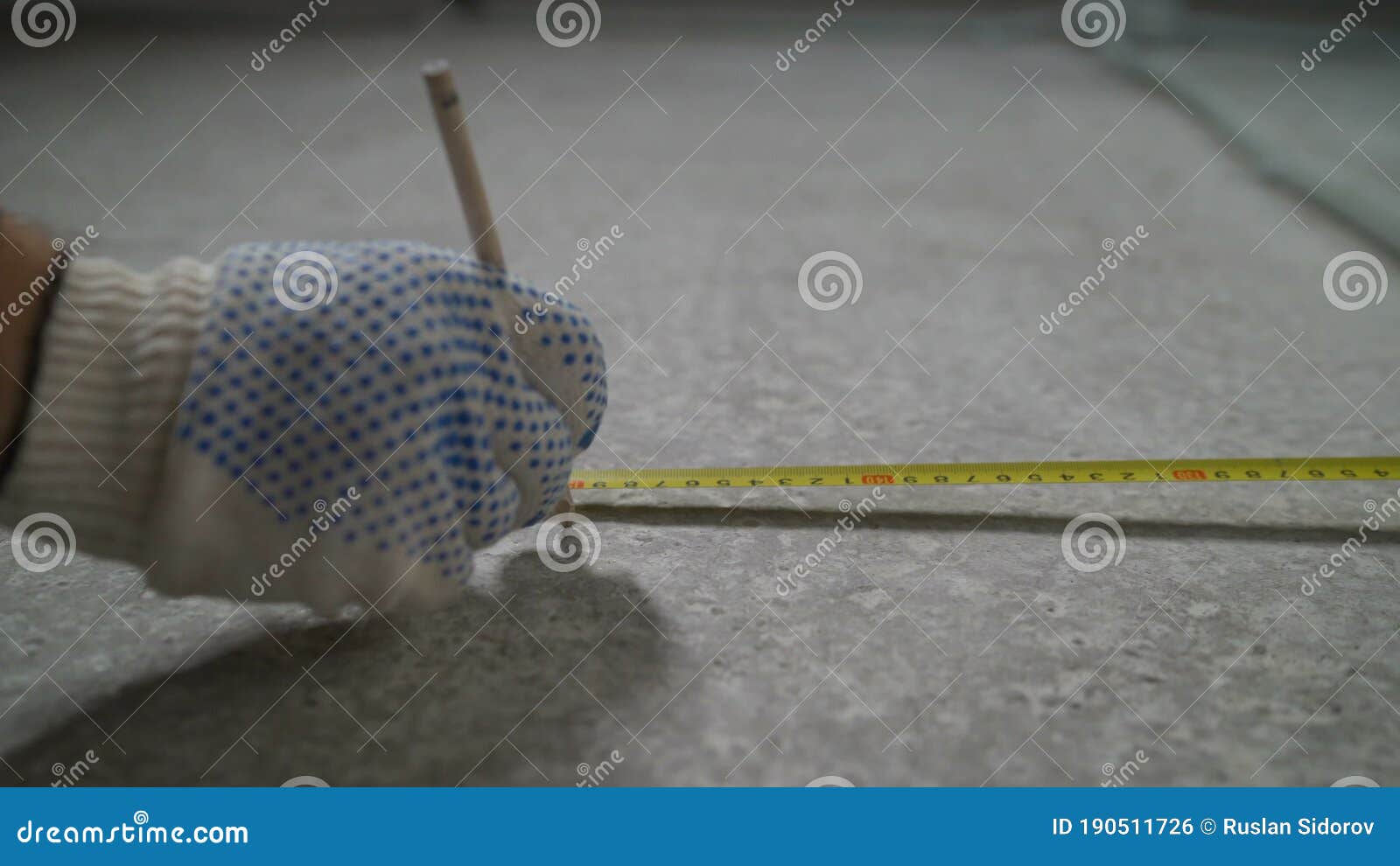 Worker Puts Marks on the Concrete Floor. Surface Preparation for ...