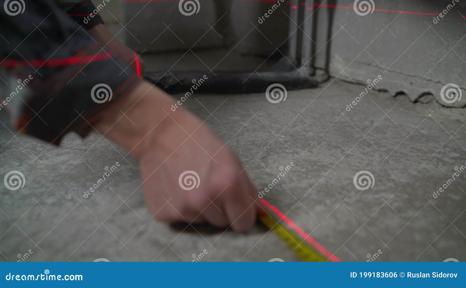 Worker Puts Marks on the Concrete Floor. Surface Preparation for ...