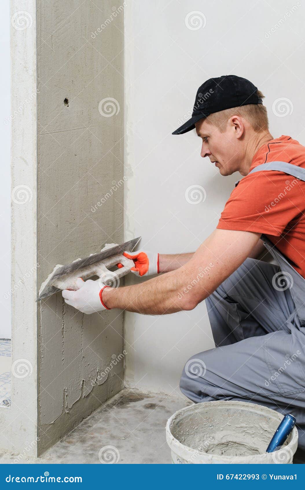 The Worker Puts the Stucco on the Wall Stock Image - Image of ...