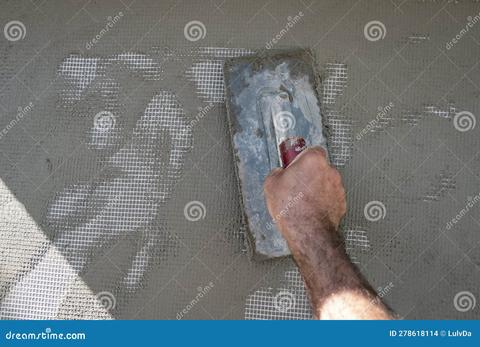Working the Cement on the Wall Stock Photo - Image of instrument, close ...