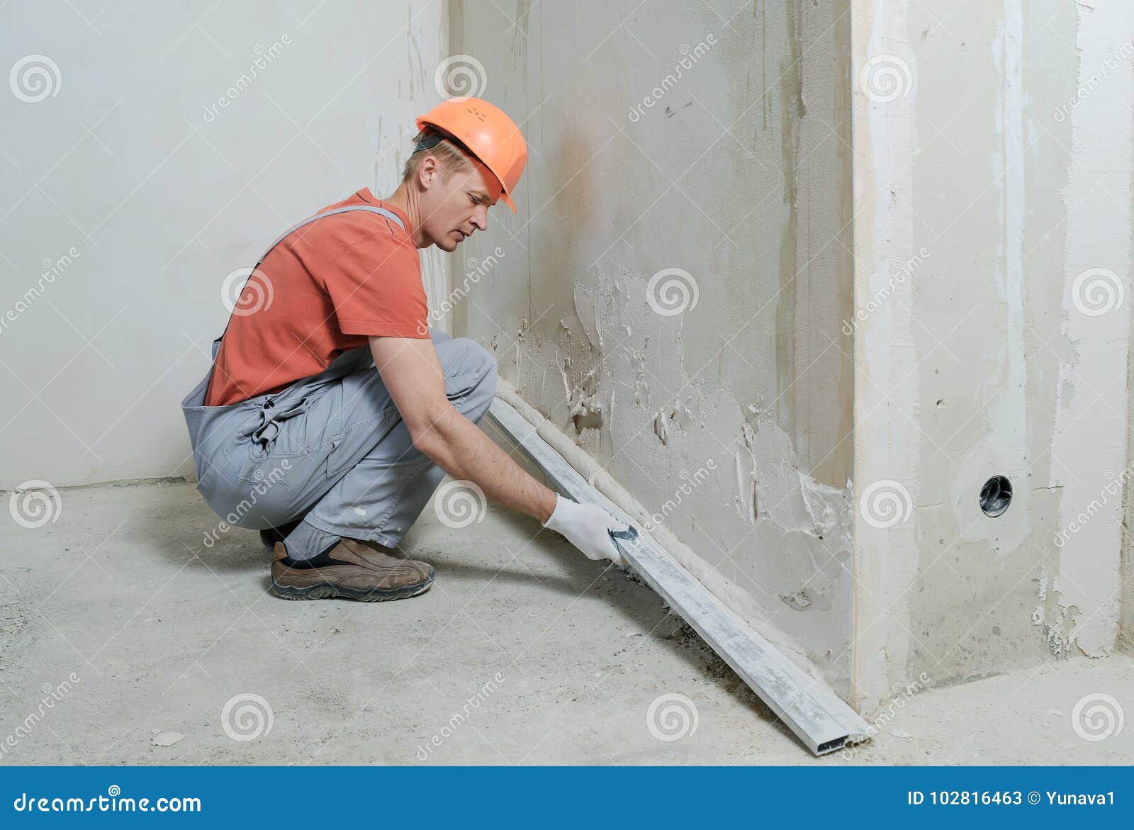 Worker is Putting a Gypsum Plaste. Stock Image - Image of long, work ...