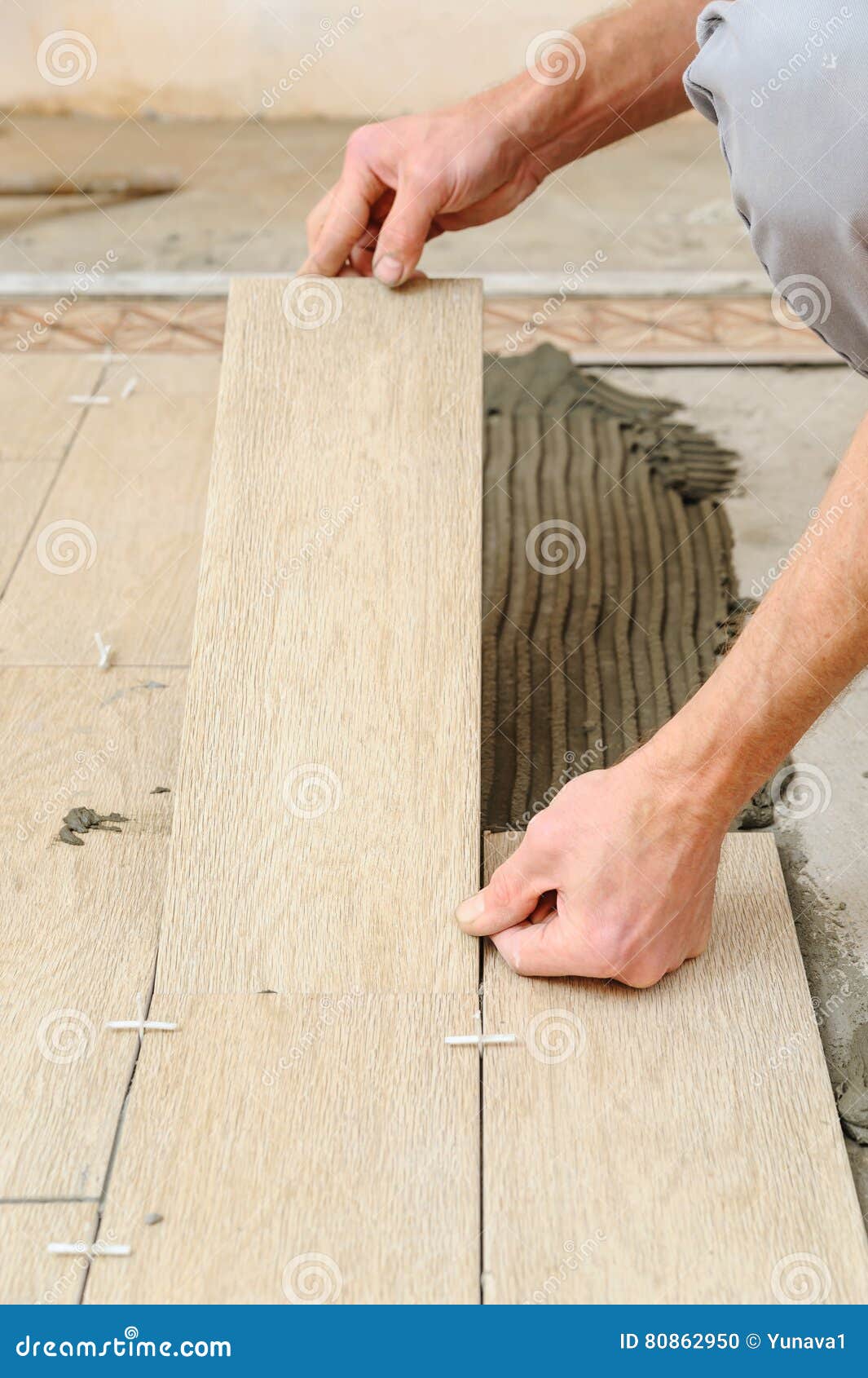 Worker Putting Tiles on the Floor. Stock Photo - Image of improvement ...