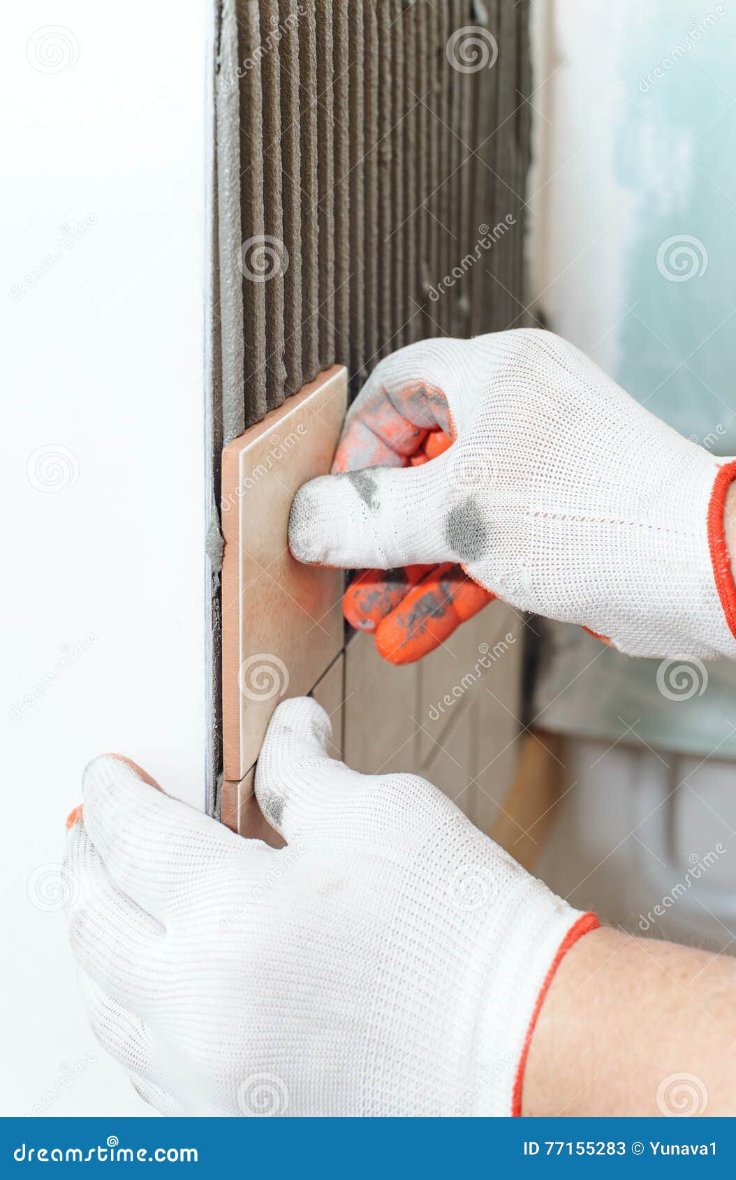 Worker Putting Tiles on the Wall in the Kitchen. Stock Image - Image of ...