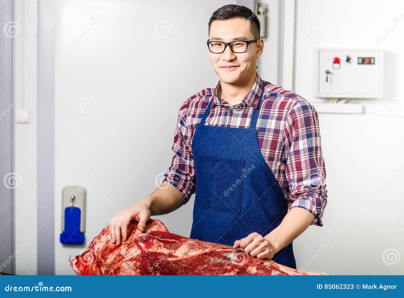 Worker with raw meat stock image. Image of carcass, industry - 85062323