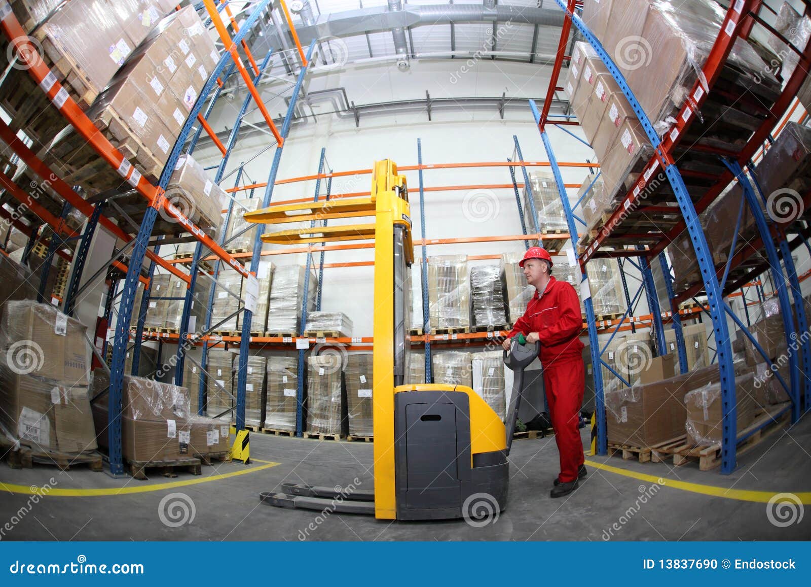Worker in Red Uniform at Work in Warehouse Stock Photo - Image of ...