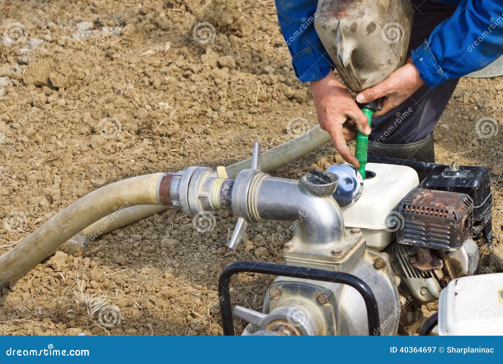 Worker refueling machine stock image. Image of hand, liquid - 40364697