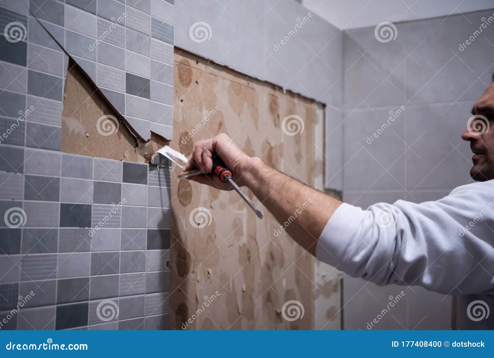 Worker Remove, Demolish Old Tiles A Bathroom With Jackhammer, Royalty ...