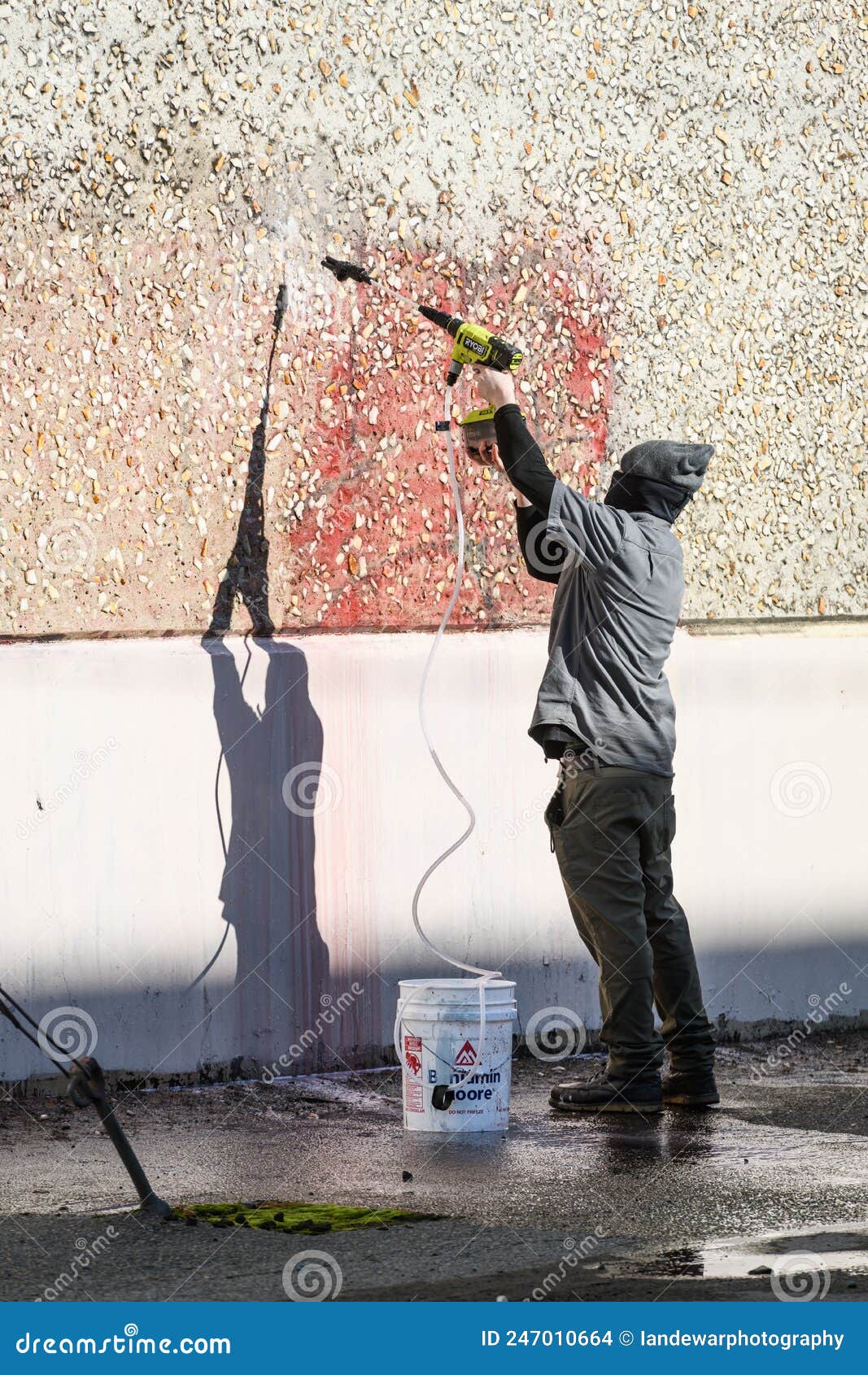 Worker Removing Graffiti from a Wall in Seattle Editorial Stock Image ...
